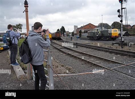 Rail Enthusiasts Photographing A British Rail Class 17 Diesel