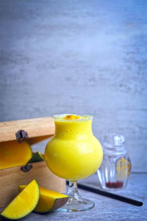 Watermelon Shake Filled Glass Cup Beside Sliced Watermelon Fruit On