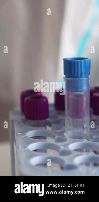 Process Of Coronavirus PCR Antigen Testing Examination By Nurse Medic In Laboratory Lab COVID