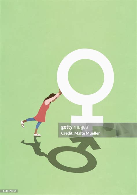 Woman Pushing Female Gender Symbol With Male Gender Shadow High Res