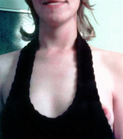 Braless Milf Popping Her Left Nip Out Of A Loose Halter Top Porn Pic