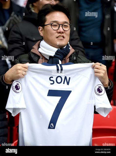 A Fan In The Stands Holds Up A Tottenham Hotspur S Son Heung Min Shirt