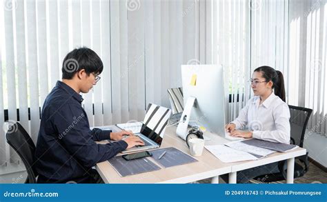 Asian Software Engineer Programmer Team Working Together On Project Of