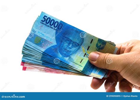 Idr Indonesian Rupiah Is The Official Currency Of Indonesia Asian Man S Hand Holding Some Money