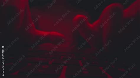 Close Up Hands Typing On Keyboard In Red Light Effect Inside The Dark