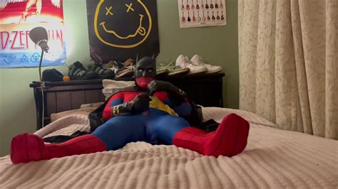 Spiderman Cosplays As Batman And Jerks Off
