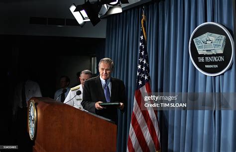 Us Secretary Of Defense Donald Rumsfeld Walks To The Podium To Give