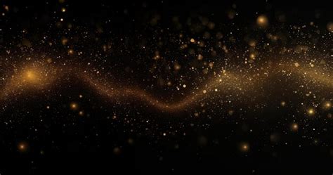 Premium Photo Black Background With Golden Glitter Particles On It In