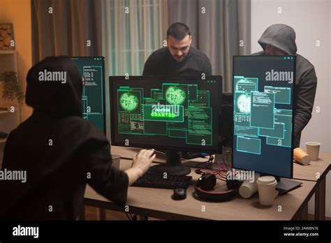 Excited Female Hacker After Getting Access Granted After A Cyber Attack On A Firewall Team Of