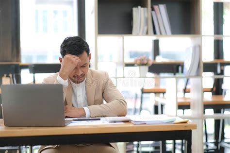 Tired Frustrated Young Asian Businessman Feeling Stressed Holding Head