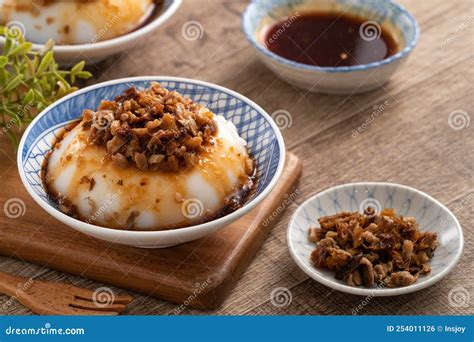 Taiwanese Savory Rice Pudding Wa Gui With Chopped Dried Radish And Soy