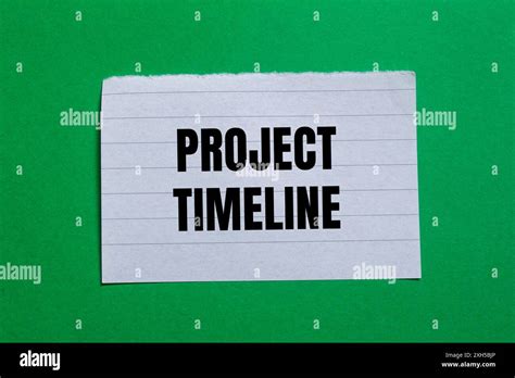 Project Timeline Message Written On Ripped Torn Paper Piece With Green Background Conceptual