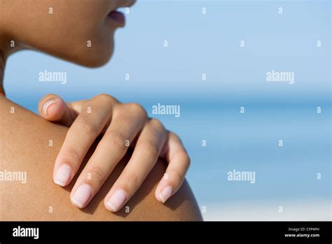Woman Touching Bare Shoulder Cropped Stock Photo Alamy