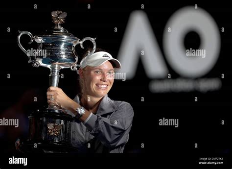 Denmarks Caroline Wozniacki Holds Her Trophy Aloft After Defeating
