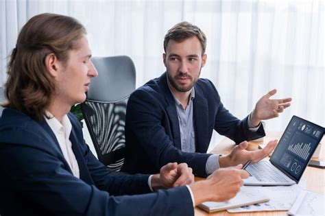 Premium Photo Busy Analyst Team In Office Analyzing Financial Data