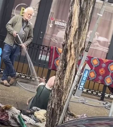 Shocking Video Homeless Woman Sprayed Down With Garden Hose By White