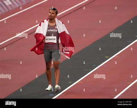 Andre De Grasse Of Canada Bronze Walks On The Track After The Final