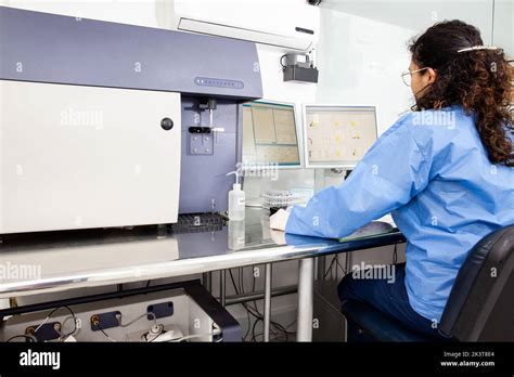 Scientist Performing A Flow Cytometric Analysis In The Laboratory Flow