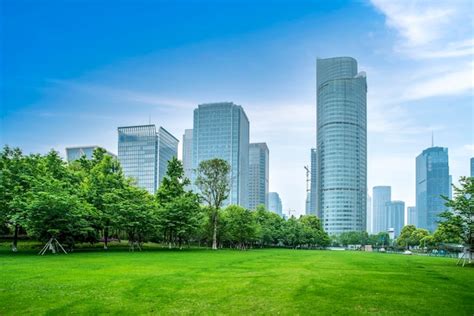 Premium Photo Street Scene With Green Grass And Modern Buildings