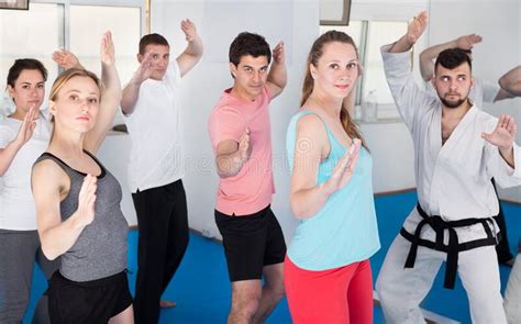 Young Adult Trainees Practicing In Karate Class Stock Image Image Of