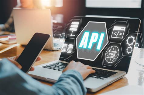 Api Application Programming Interface Man Hand Holding Vr Screen Api Icon On Office Desk
