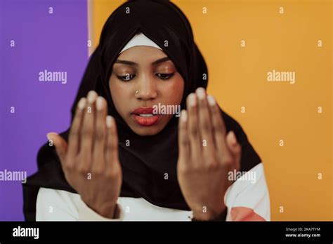 African Muslim Woman Wearing Hijab And Traditional Muslim Clothes