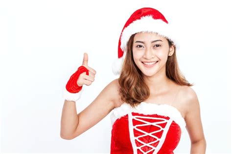 Premium Photo Portrait Of Smiling Woman In Santa Costume Gesturing