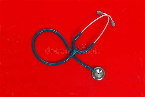Stethoscope Red Leather Background Healthcare Object Stock Image