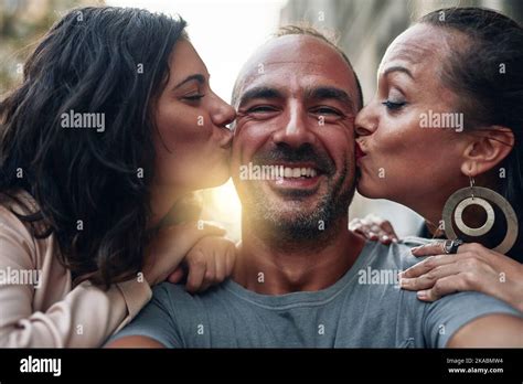 They Are All The Love I Need Two Women Kissing Their Male Friend On