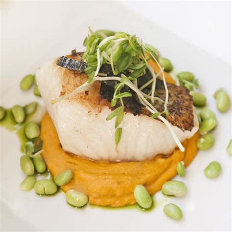 Asian Style Sea Bass With A Carrot Ginger Puree And Edamame
