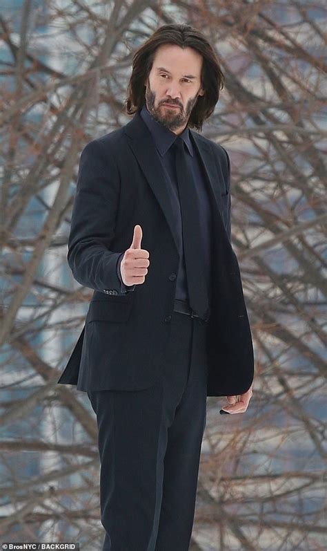 Keanu Reeves Slides Down A Rail While On Snowy NY Set Of The New John
