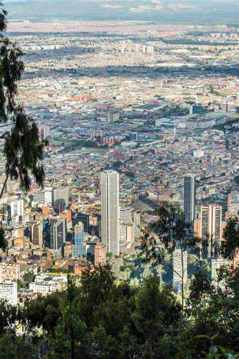 Vertical Aerial View Of Bogota Cityscape With Tall Buildings And A