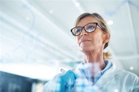 Woman Science And Thinking With Formula On Glass Wall At Laboratory For Planning Strategy And
