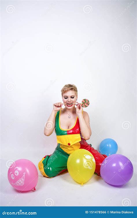 Cute Chubby Girl With Short Blonde Hair And Plus Size Figure In Bright