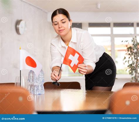 Preparing For Negotiations Positive Female Employee Of The Protocol Department Places The