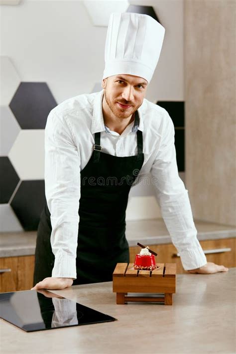 Male Pastry Cook Decorating Dessert In Kitchen Stock Image Image Of Profession Apron 116341313
