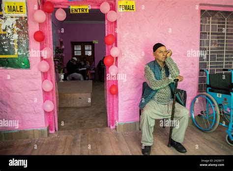 An Elderly Man Waits Outside A Polling Station To Cast His Vote During