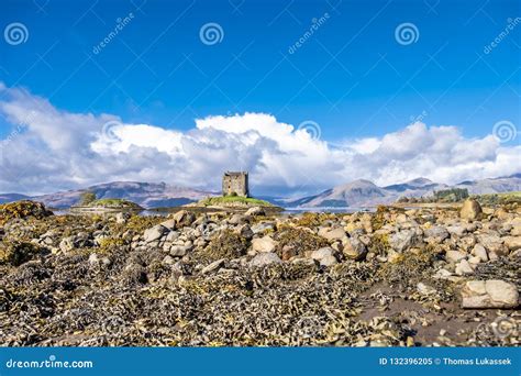 View Of The Castle Stalker In Autumn On The Low Tide Near Port Appin