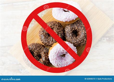 Close Up Of Glazed Donuts Pile Behind No Symbol Royalty Free Stock
