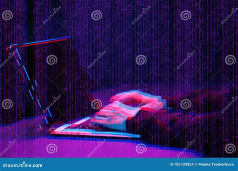 Hacker Working With Laptop In Dark Room With Digital Interface Around