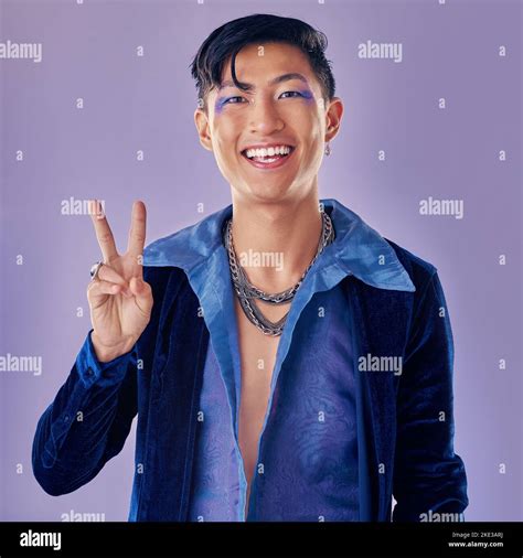 Fashion Peace Sign And Smile Of Punk Man In Studio With Smile And