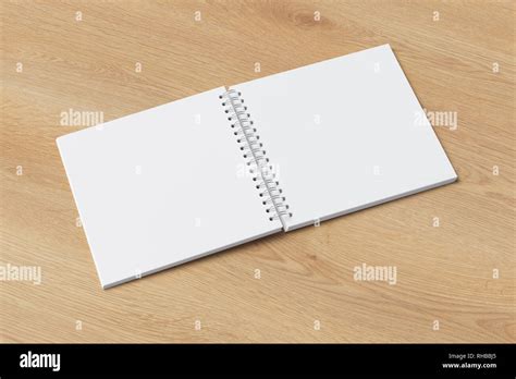 Blank Open Square Spiral Notepad On Wooden Background With Clipping Path Around Notebook Pages