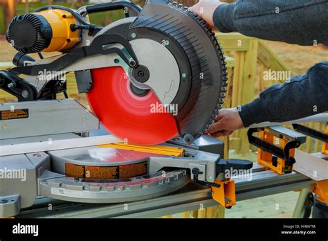 Man Cutting Wood On Electric Saw Saws For Cutting Trees Stock Photo Alamy