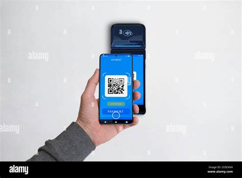 Smartphone Scanning A Qr Code On A Pos Terminal To Complete A Payment
