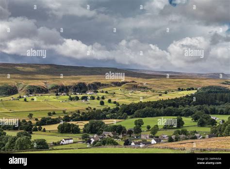 A Bright Interval Lights Up The Hamlets Of Holwick In The Distance And