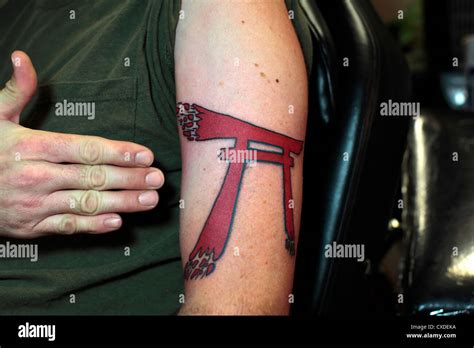 Torii Gate Tattoo On Man S Upper Arm Stock Photo Alamy