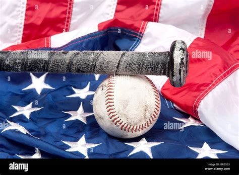 Baseball Equipment Including A Bat And A Baseball On An American Flag