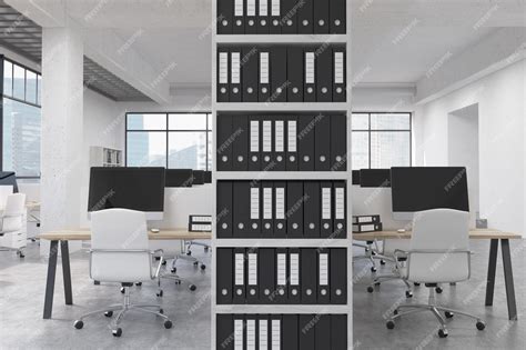 Premium Photo Office With Binders And Computers