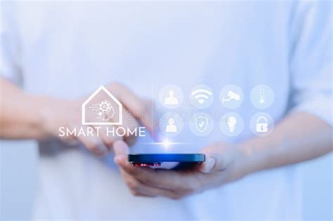 adult man control technology ai smart home devices using a smartphone