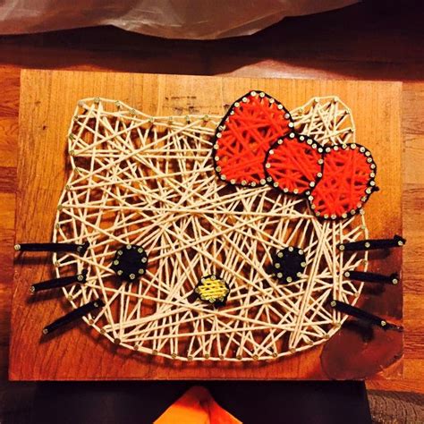 The String Art Is Made To Look Like Hello Kitty